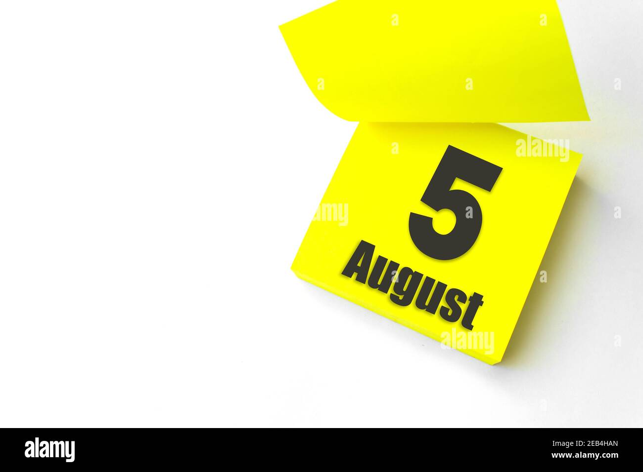 August 5th. Day 5 of month, Calendar date. Close-Up Blank Yellow paper ...