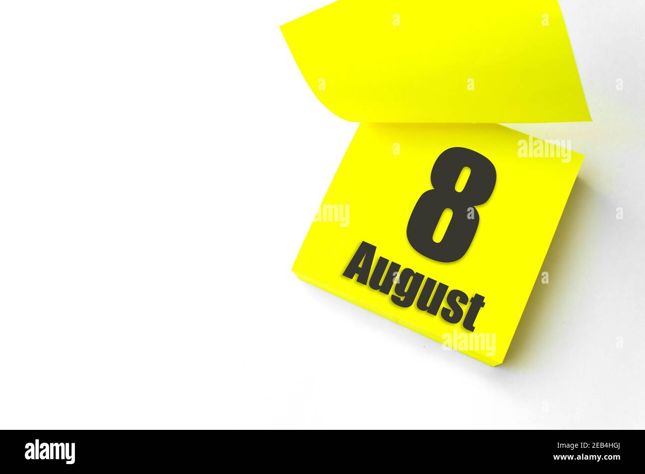 August 8th. Day 8 of month, Calendar date. Close-Up Blank Yellow paper ...