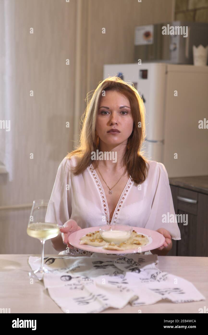 Girl drinking white wine Stock Photo - Alamy