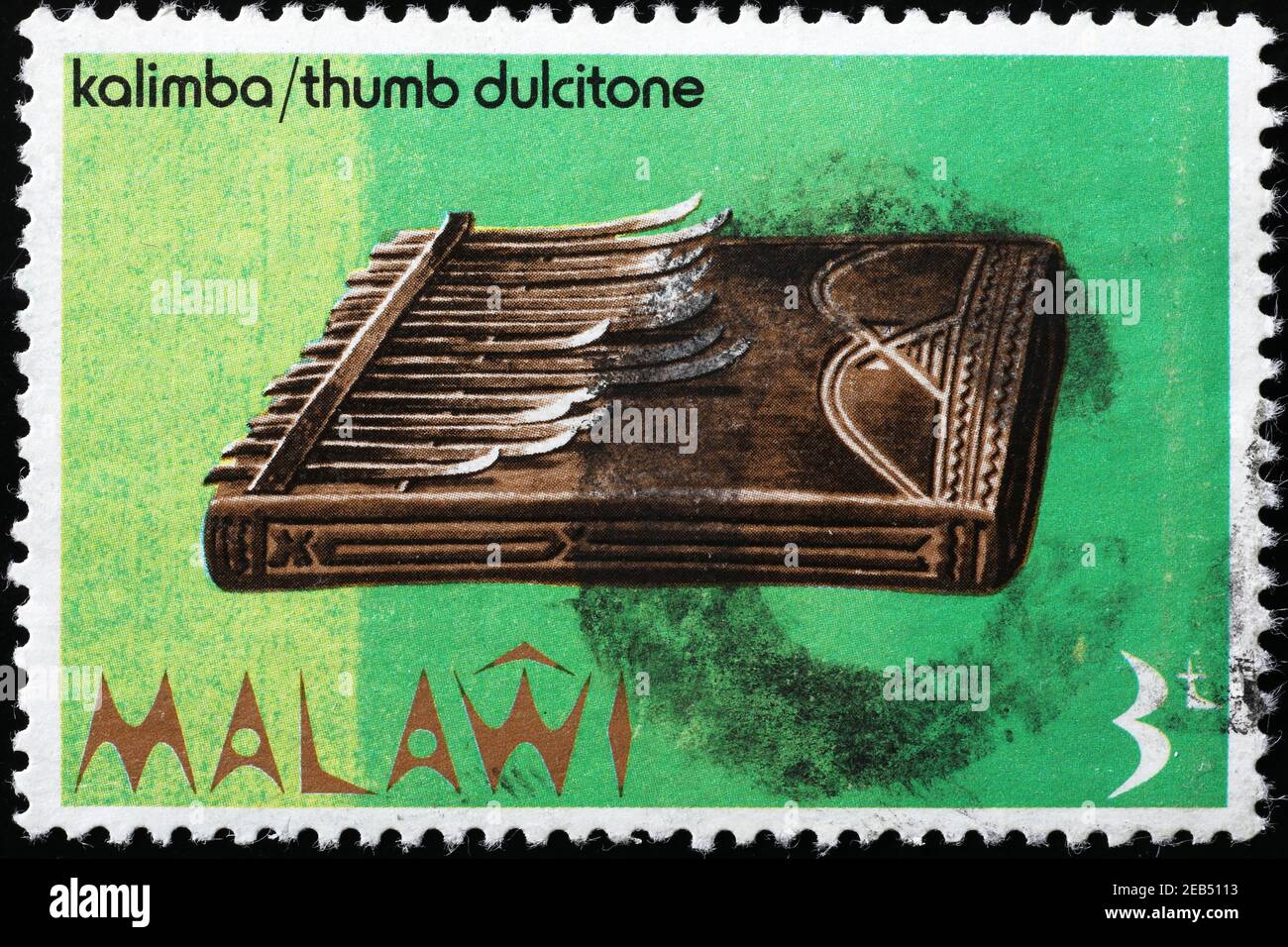 African musical instrument on stamp of Malawi Stock Photo - Alamy