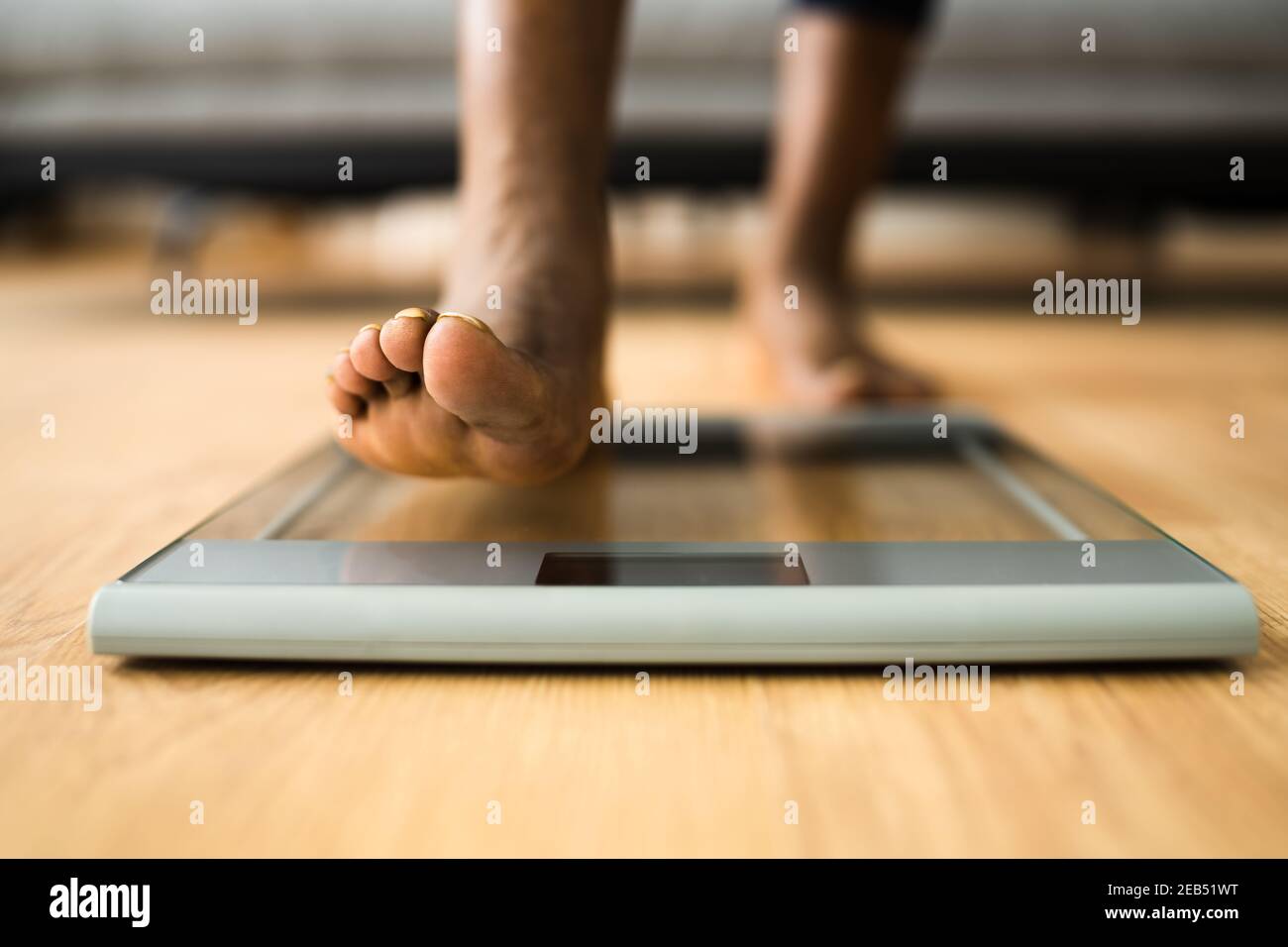 Weightloss Check After Workout. Weighing Scale Measure Stock Photo - Alamy