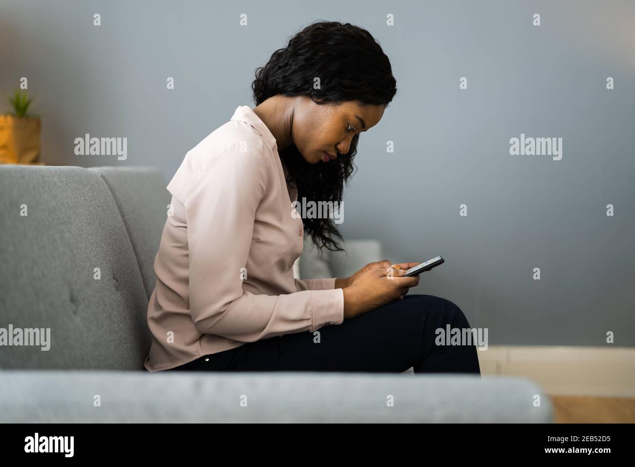 Incorrect Posture And Backache Using Smartphone Or Phone Stock Photo ...