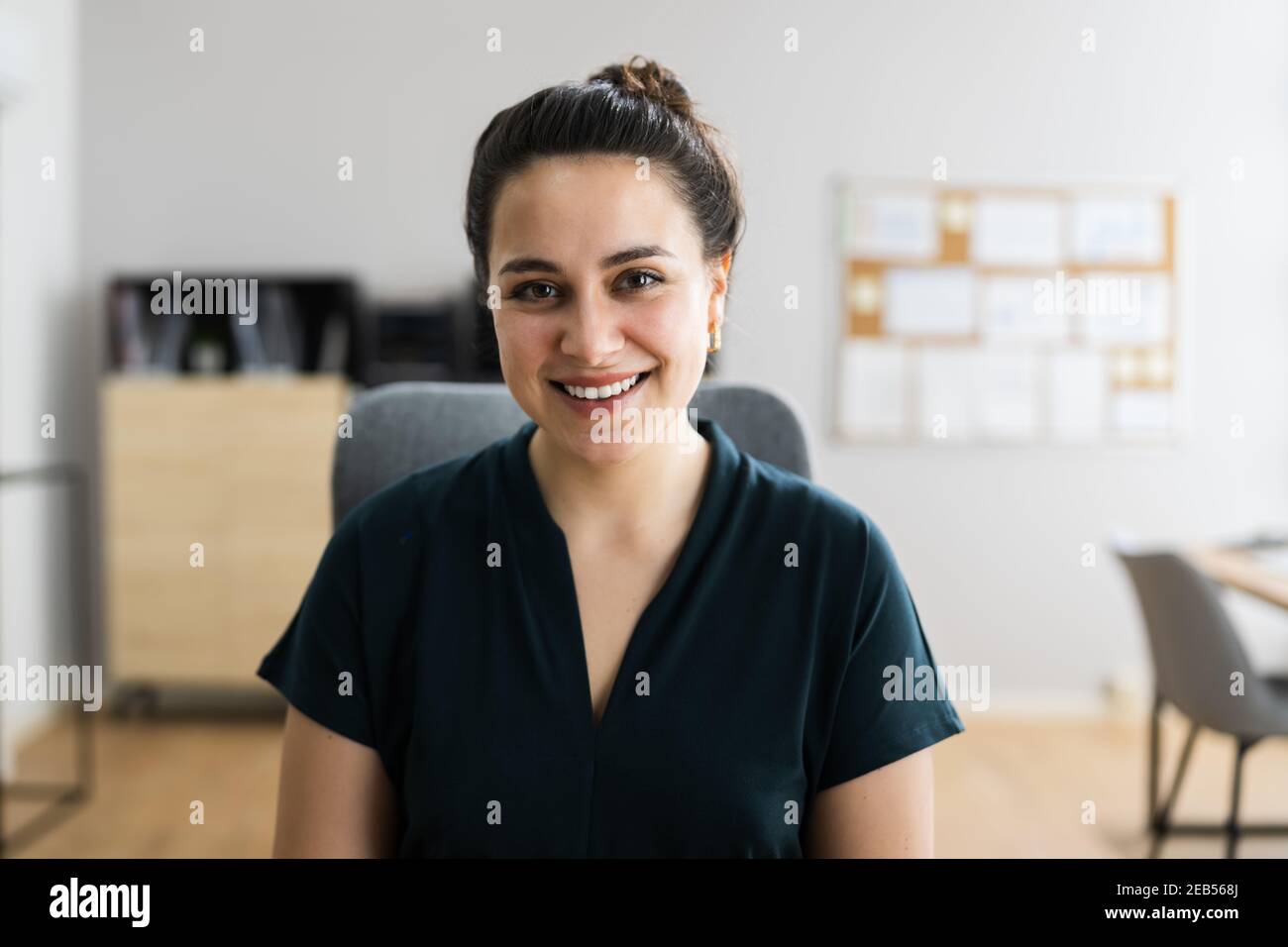 Happy Smiling Professional Employee Portrait In Office Stock Photo - Alamy