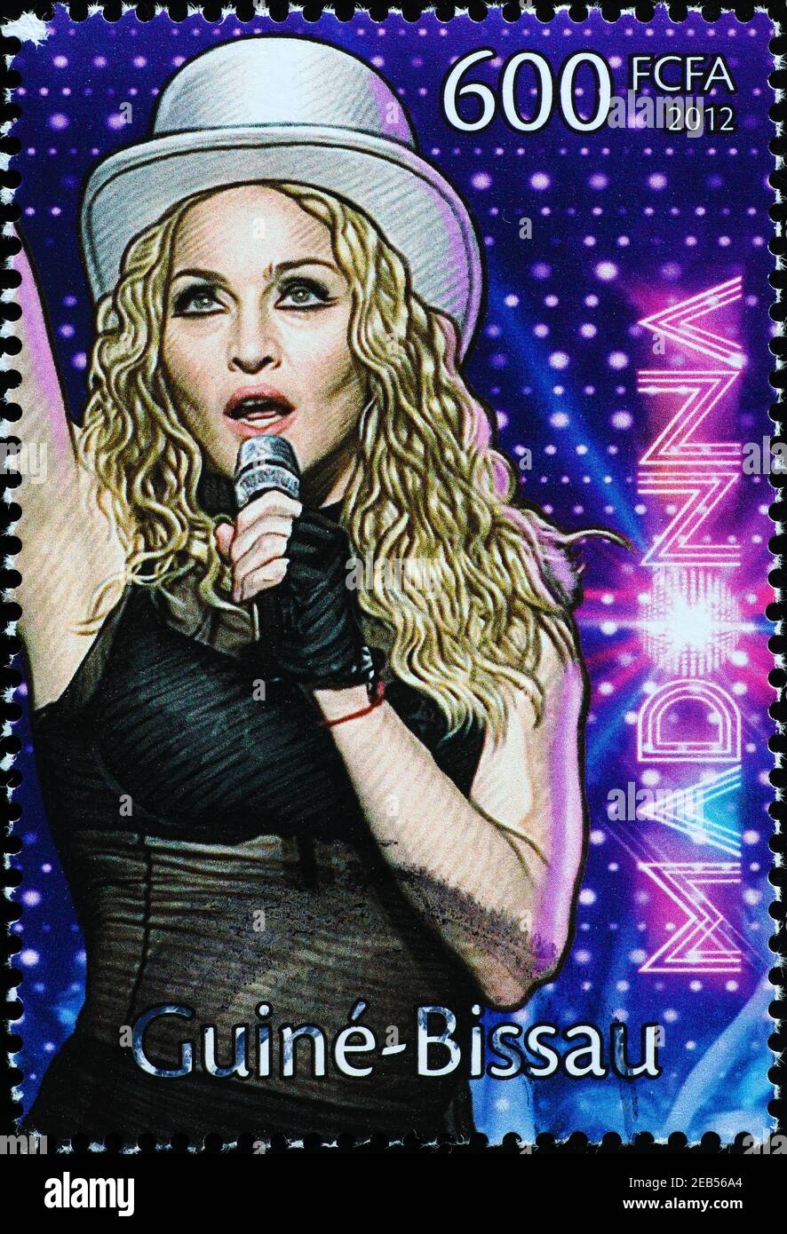 Madonna in concert on postage stamp Stock Photo - Alamy