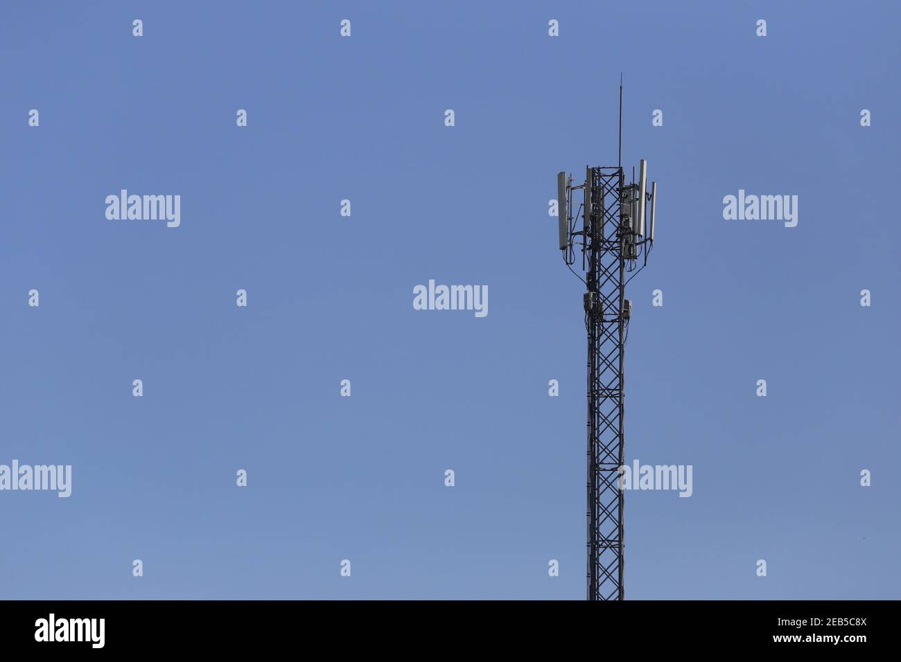 Signal tower on a blue sky background and have copy space Stock Photo ...