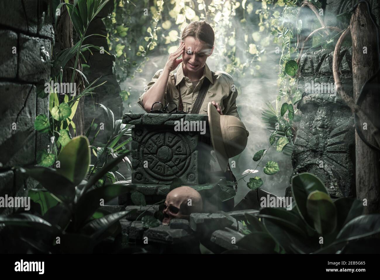 Explorer woman lost in the jungle, she is desperate and she is having a ...