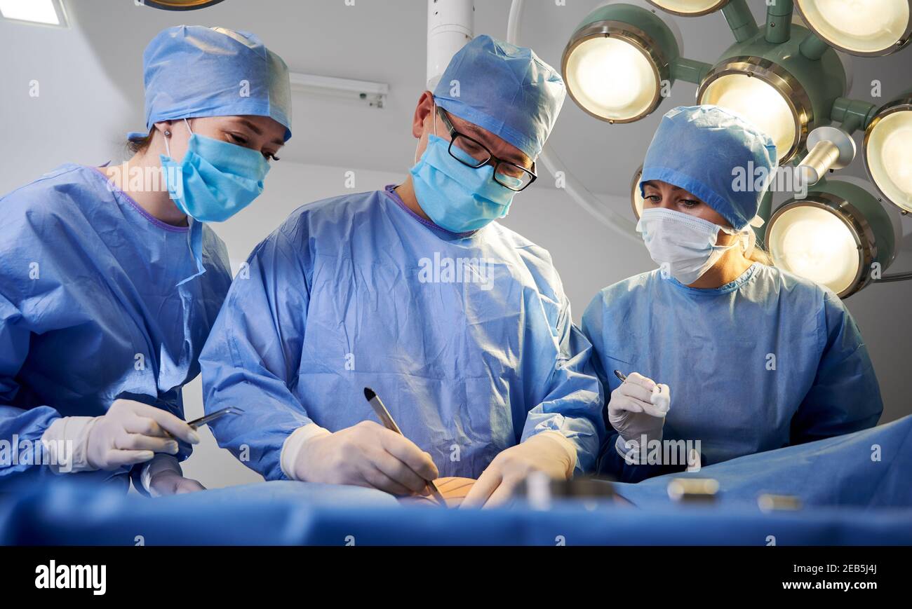 Surgeon correction hi-res stock photography and images - Alamy