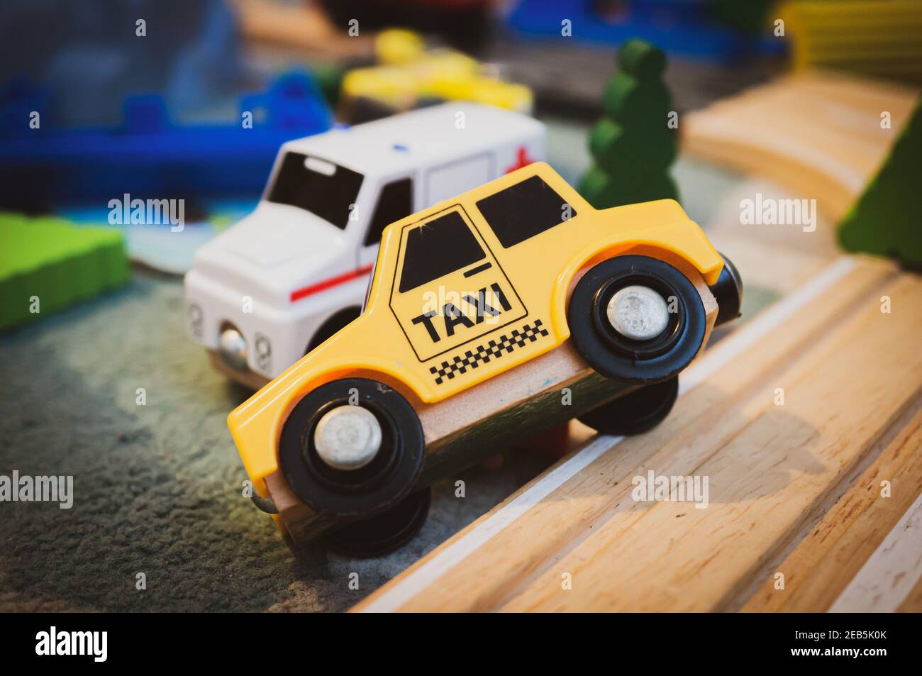 Toy taxi and ambulance vehicle Stock Photo - Alamy