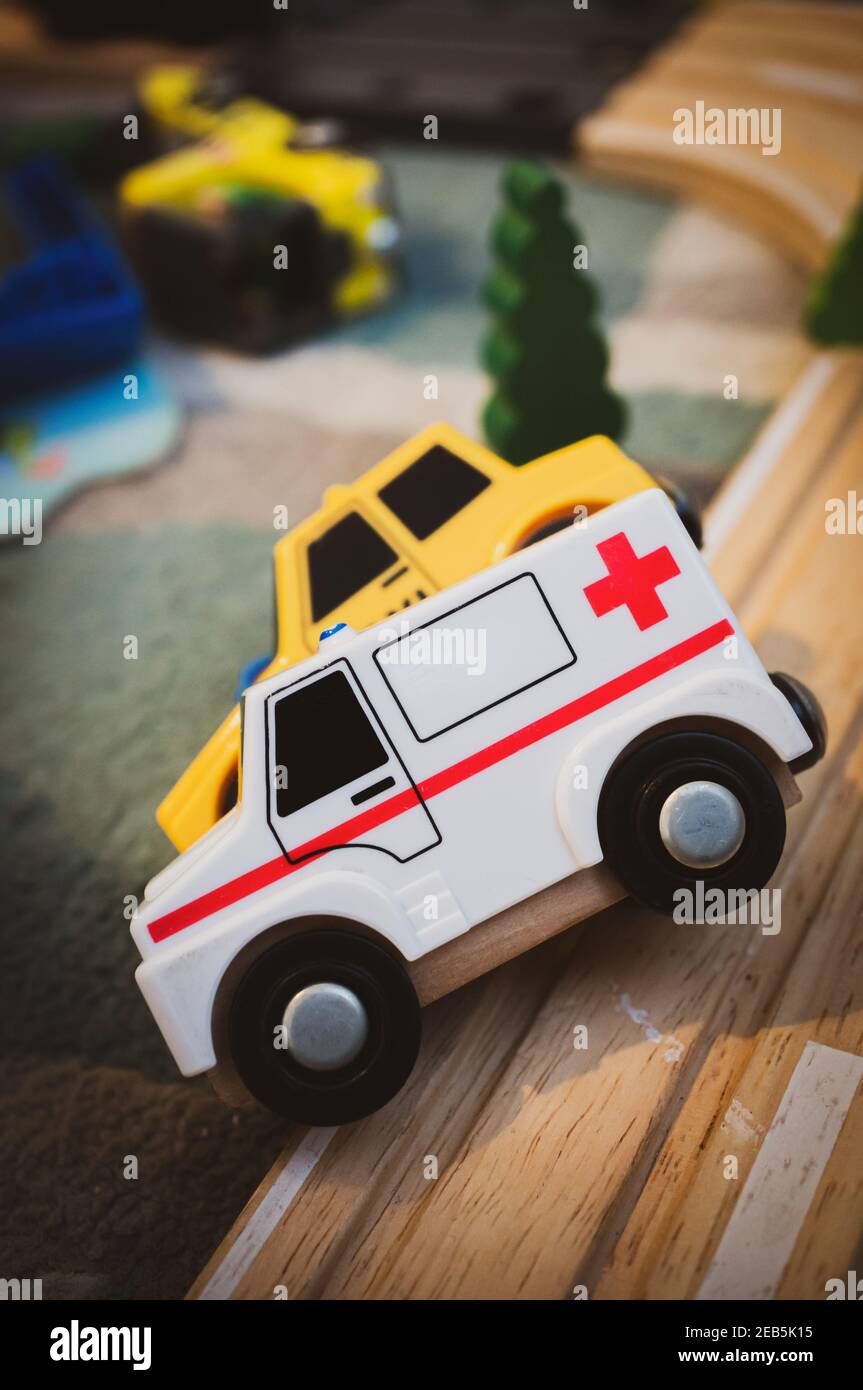 Toy taxi and ambulance vehicle Stock Photo - Alamy