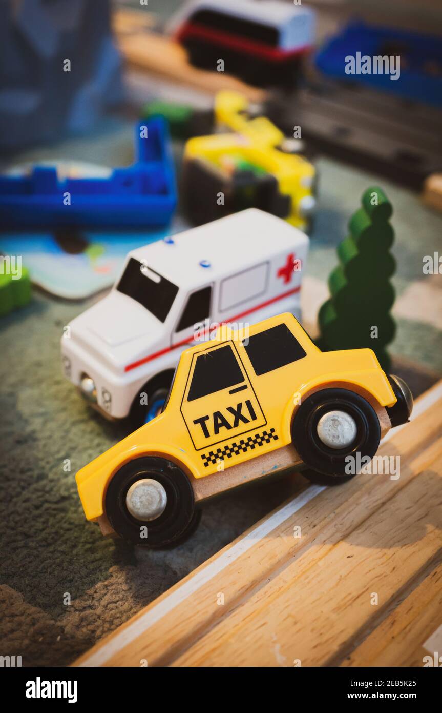 Toy taxi and ambulance vehicle Stock Photo - Alamy