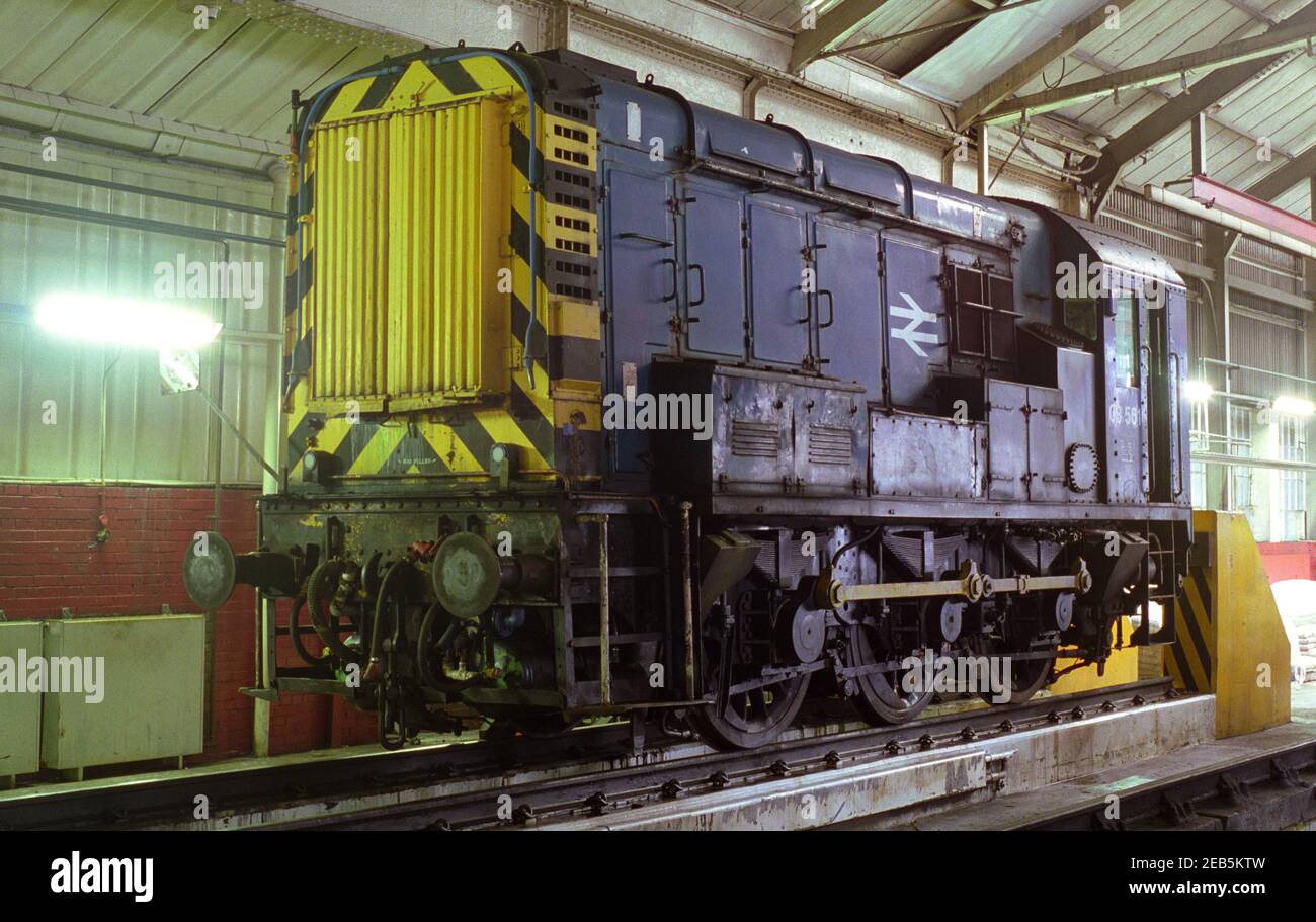 British Rail class 08 diesel shunting locomotives in the engine shed undergoing maintenance ...