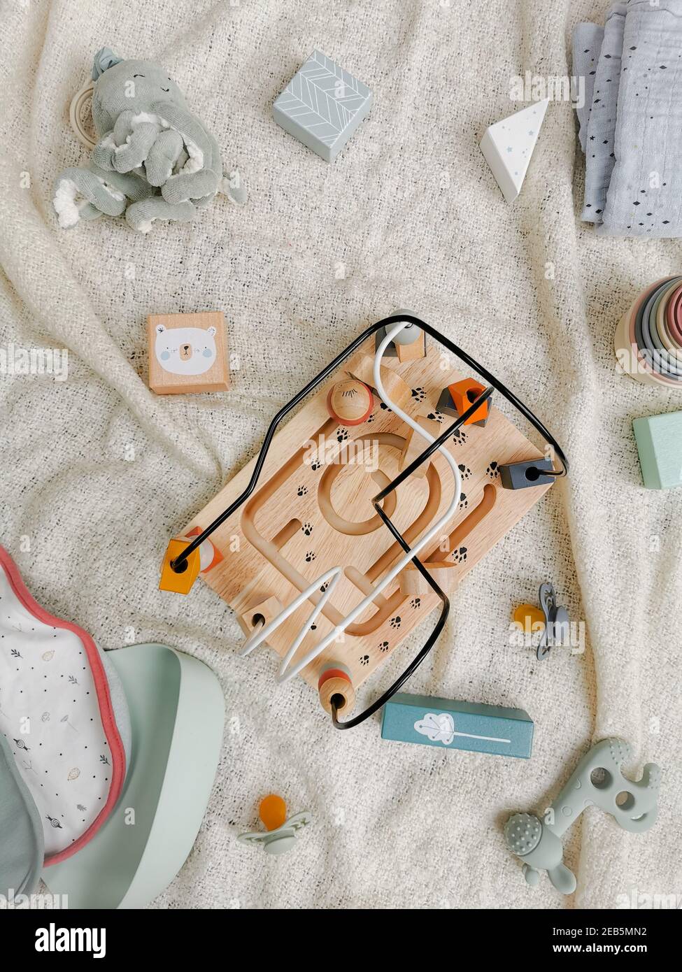 Gender neutral toys for babies in muted soft colors. Wooden blocks en ...