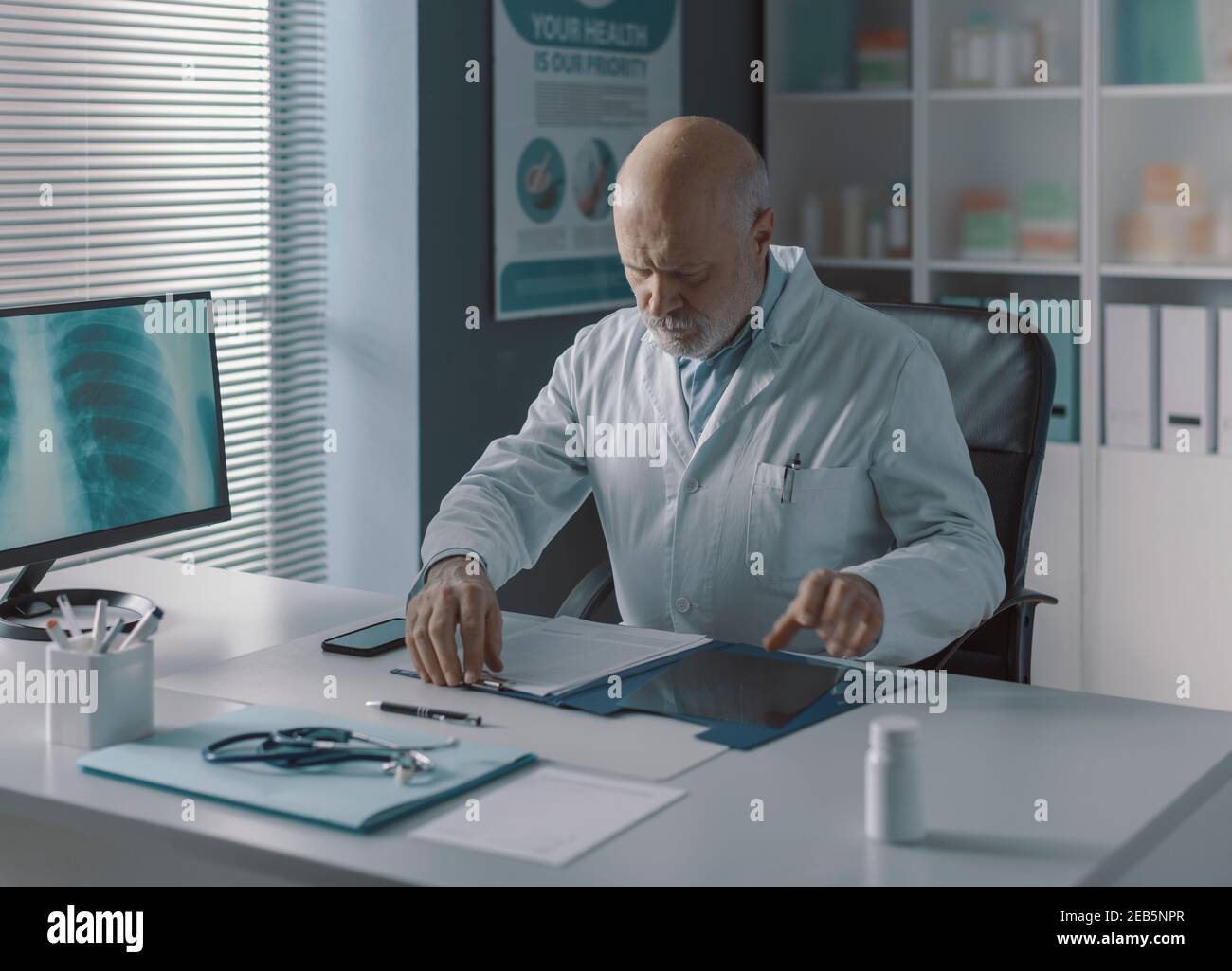 Professional doctor working in hi-res stock photography and images - Alamy