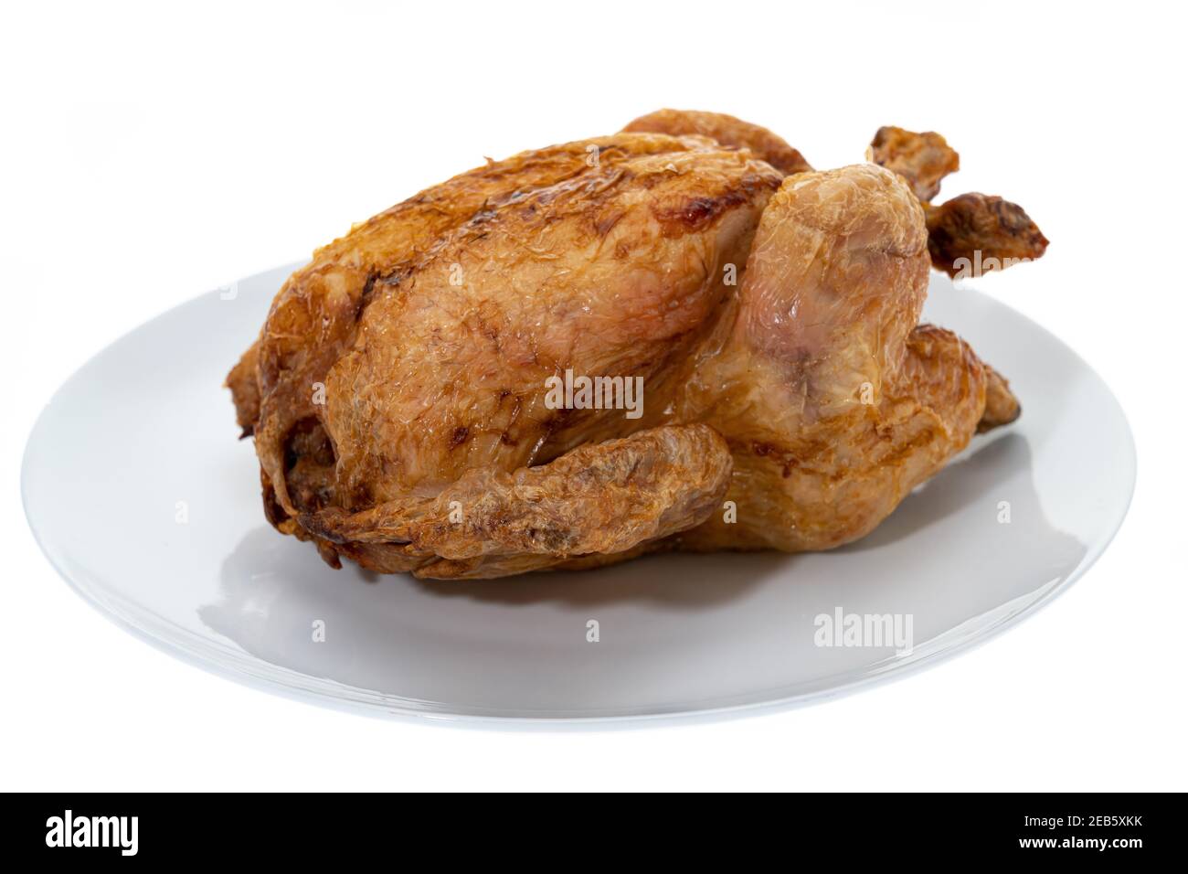 Whole roasted chicken - white background Stock Photo - Alamy