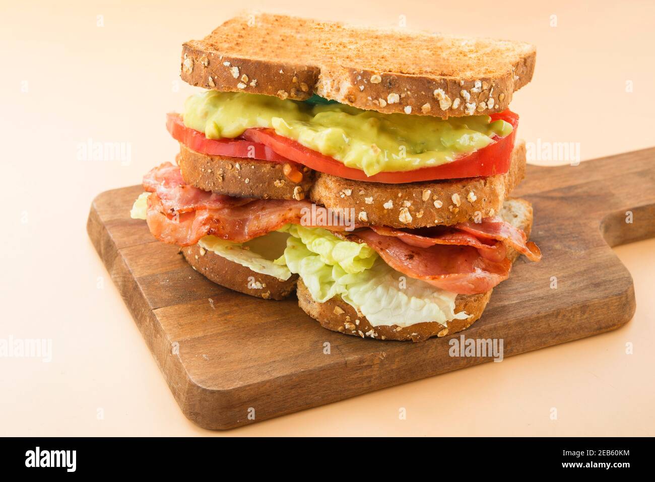 Sandwich LGBT lettuce, guacamole, bacon and tomato Stock Photo - Alamy