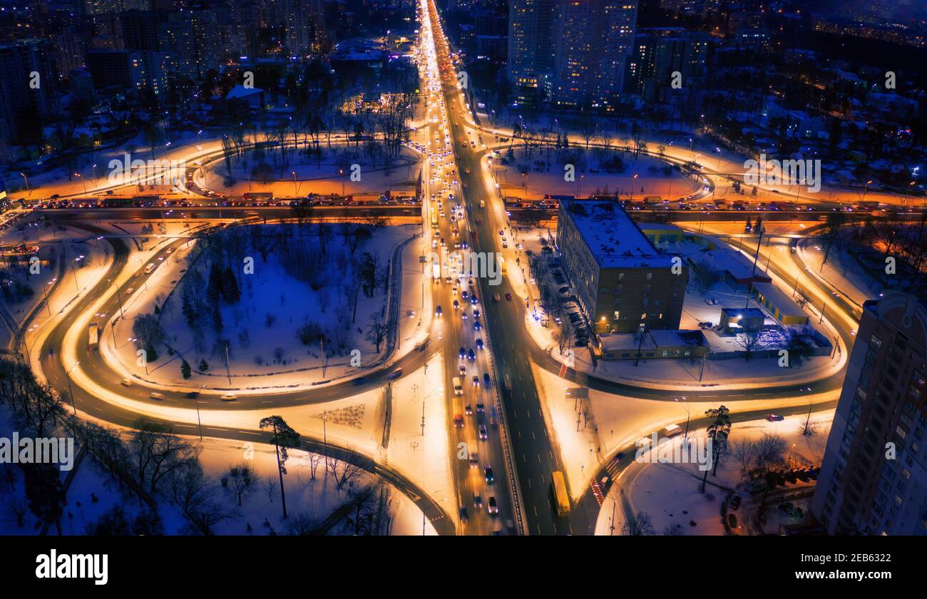 Traffic interchange in the night city. Top view Stock Photo - Alamy