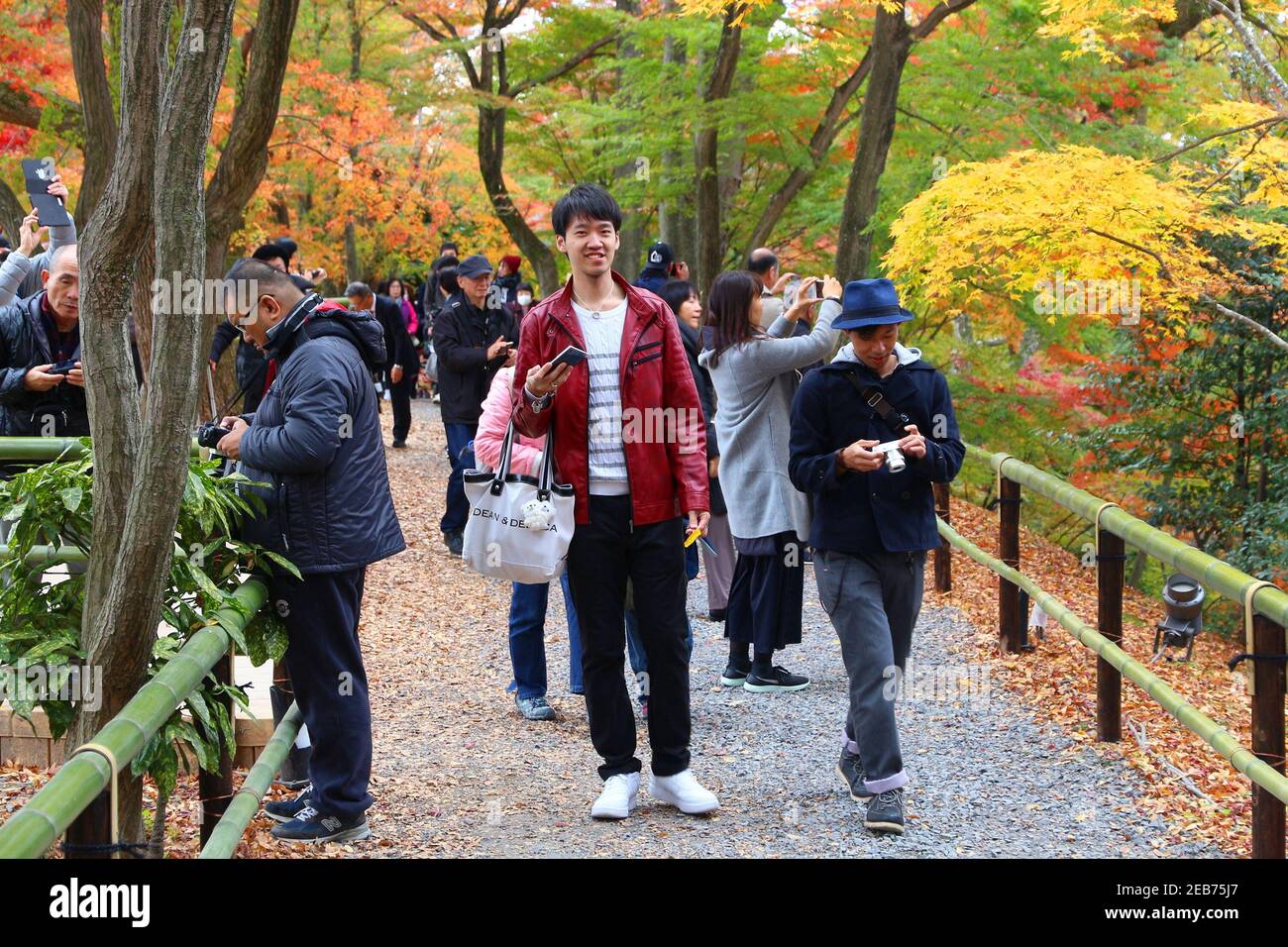 KYOTO, JAPAN - NOVEMBER 25, 2016: People visit Kitano Tenmangu shrine ...