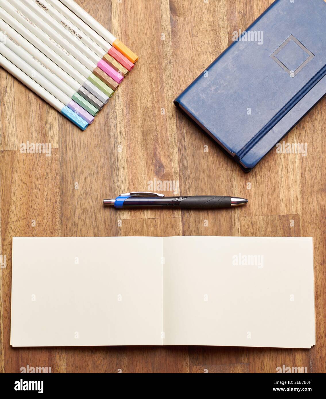 Office background materials with pen colors Stock Photo - Alamy