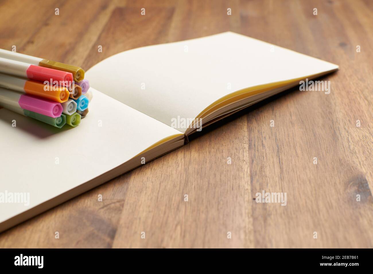 Pens notebook desk hi-res stock photography and images - Alamy