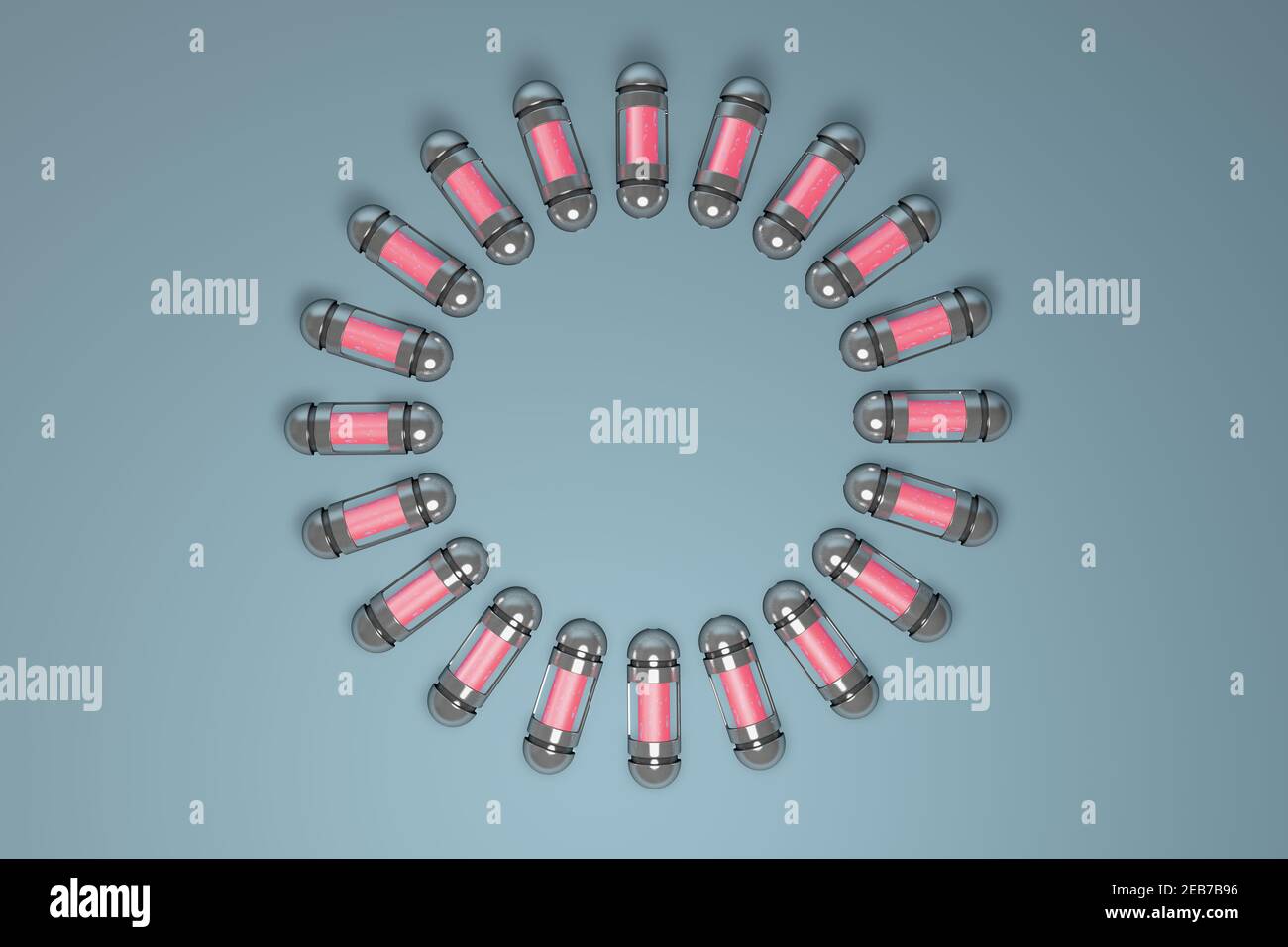 Metal capsules forming a circle on a blue background Stock Photo - Alamy