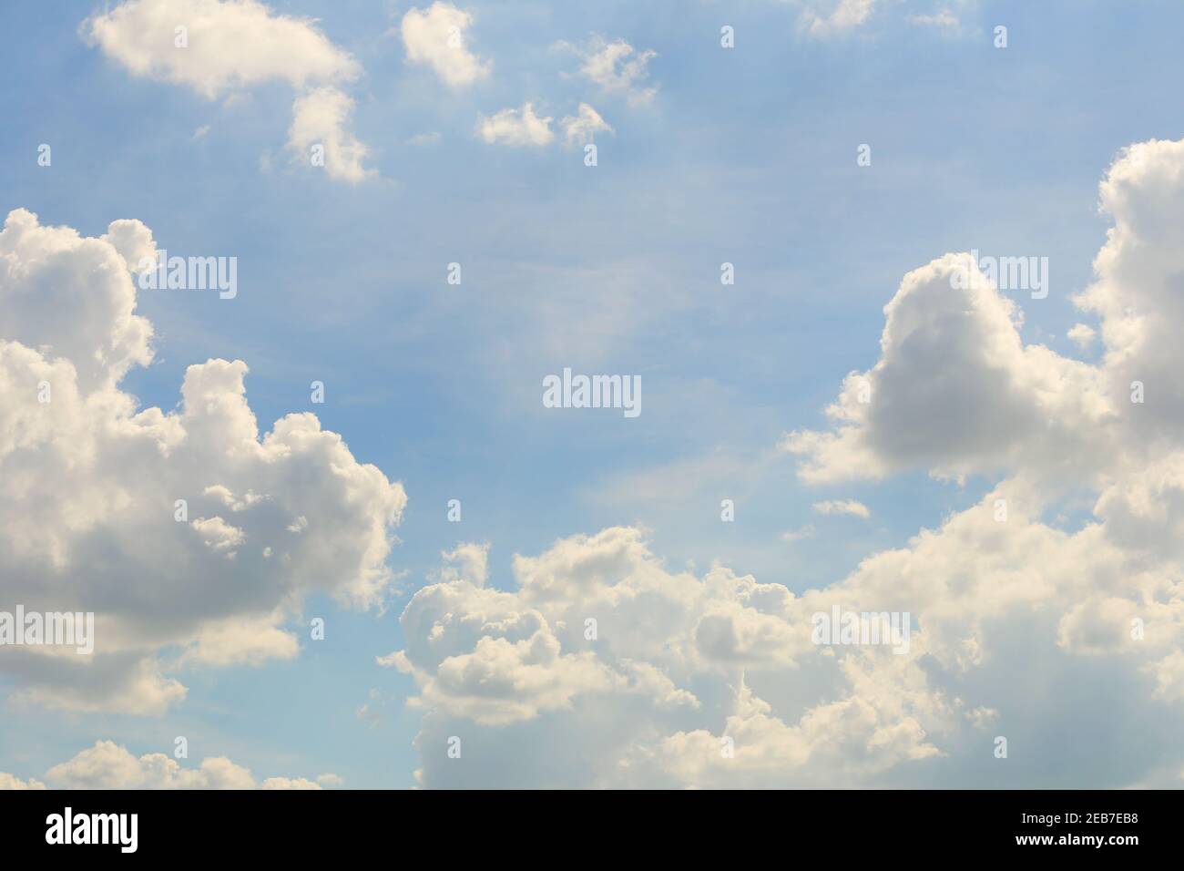 Blue sky with white clouds in the daytime background for design in you work idea concept Stock ...