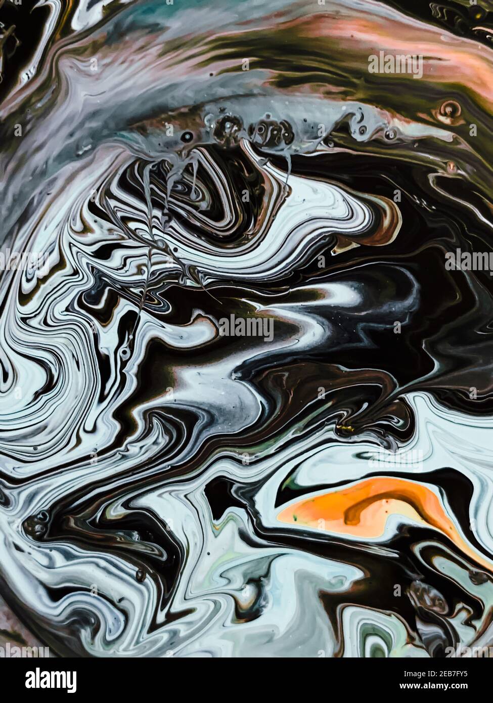 Abstract artwork with colorful paint stains and beautiful wave patterns ...