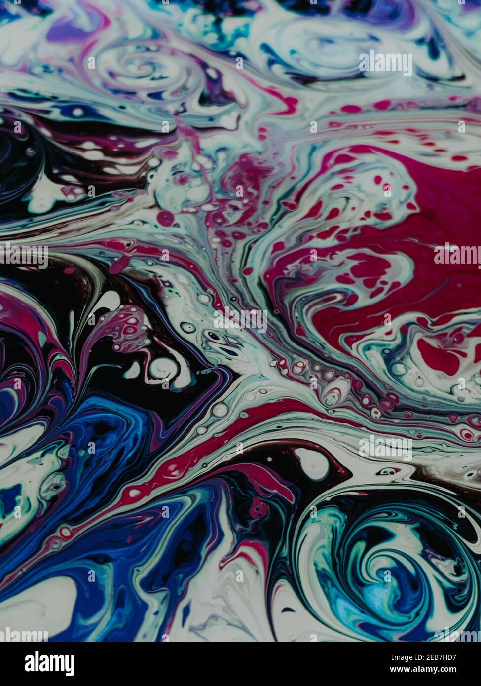 Abstract artwork with colorful paint stains and beautiful wave patterns ...