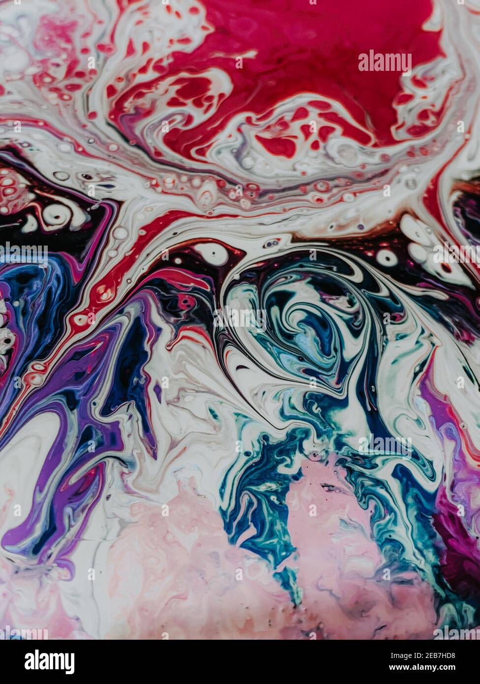 Abstract artwork with colorful paint stains and beautiful wave patterns ...