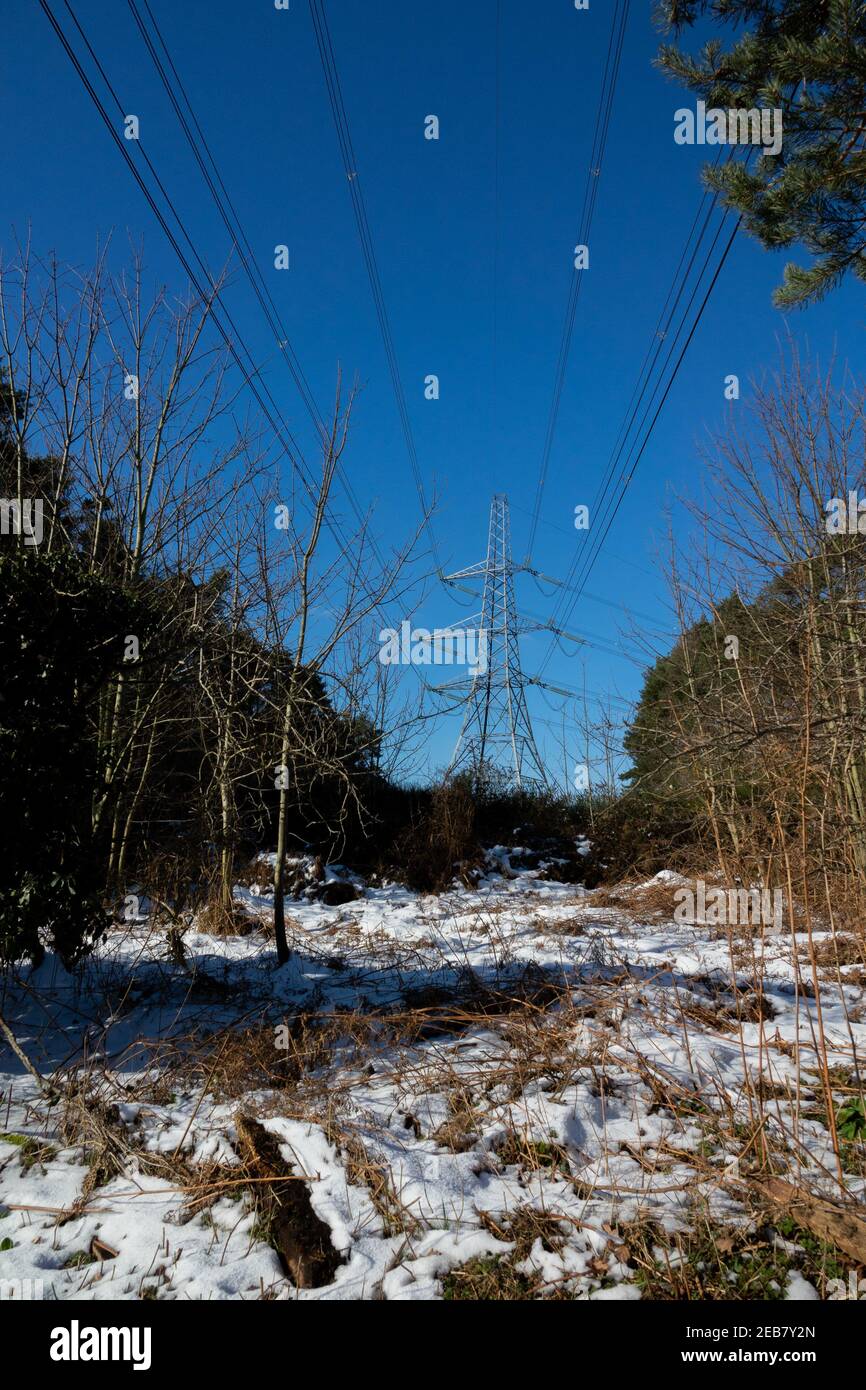 Elictricity pylon in the snow hi-res stock photography and images - Alamy