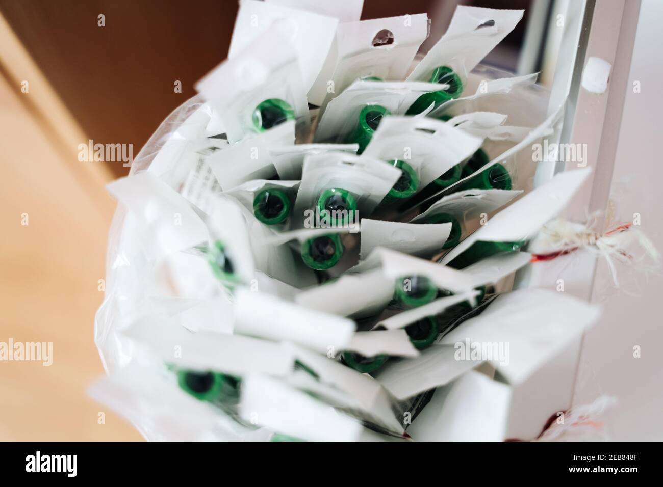 photo of medical plastic new needles box Stock Photo - Alamy