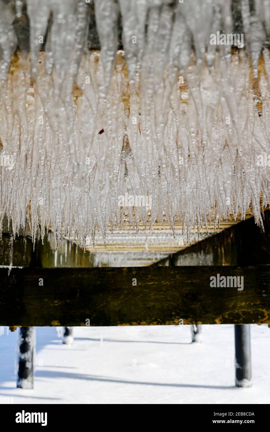 Flensburg, Germany. 12th Feb, 2021. Icicles have formed on a bridge on ...