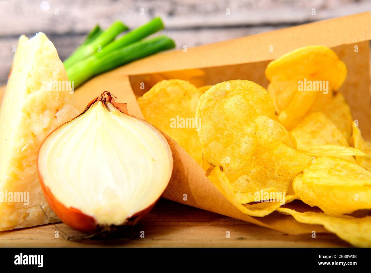 Homemade cheese and onion crisp in a paper bag Stock Photo - Alamy