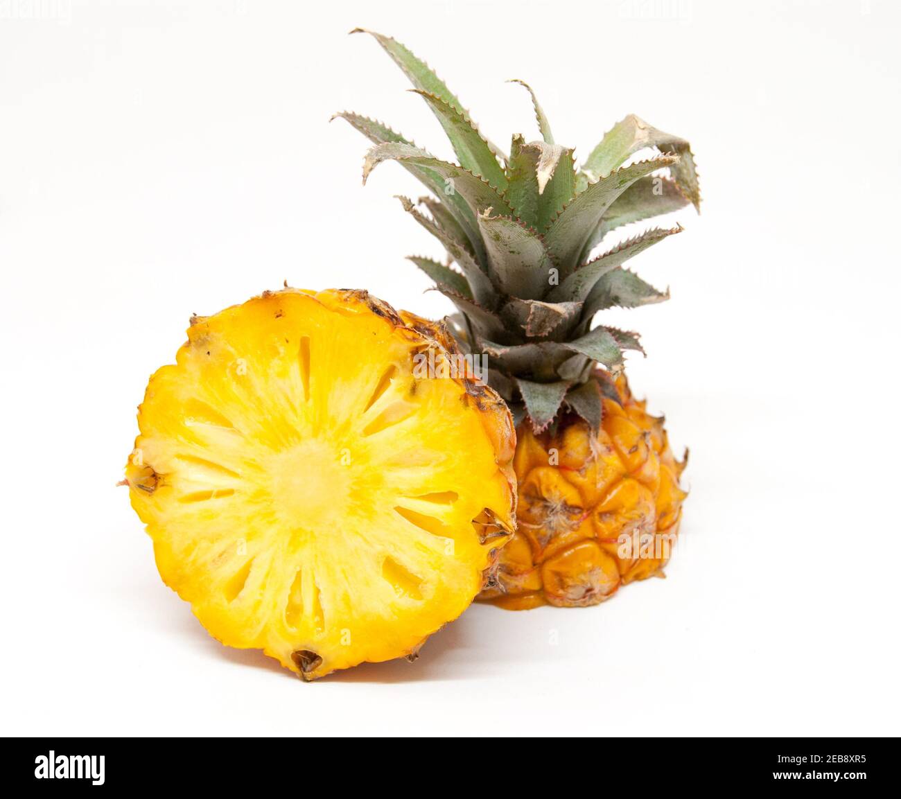 Pineapple cut in half hi-res stock photography and images - Alamy