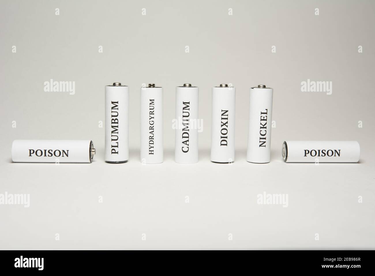 Battery on a white background. Battery for charging. Ecology. Harm to ...