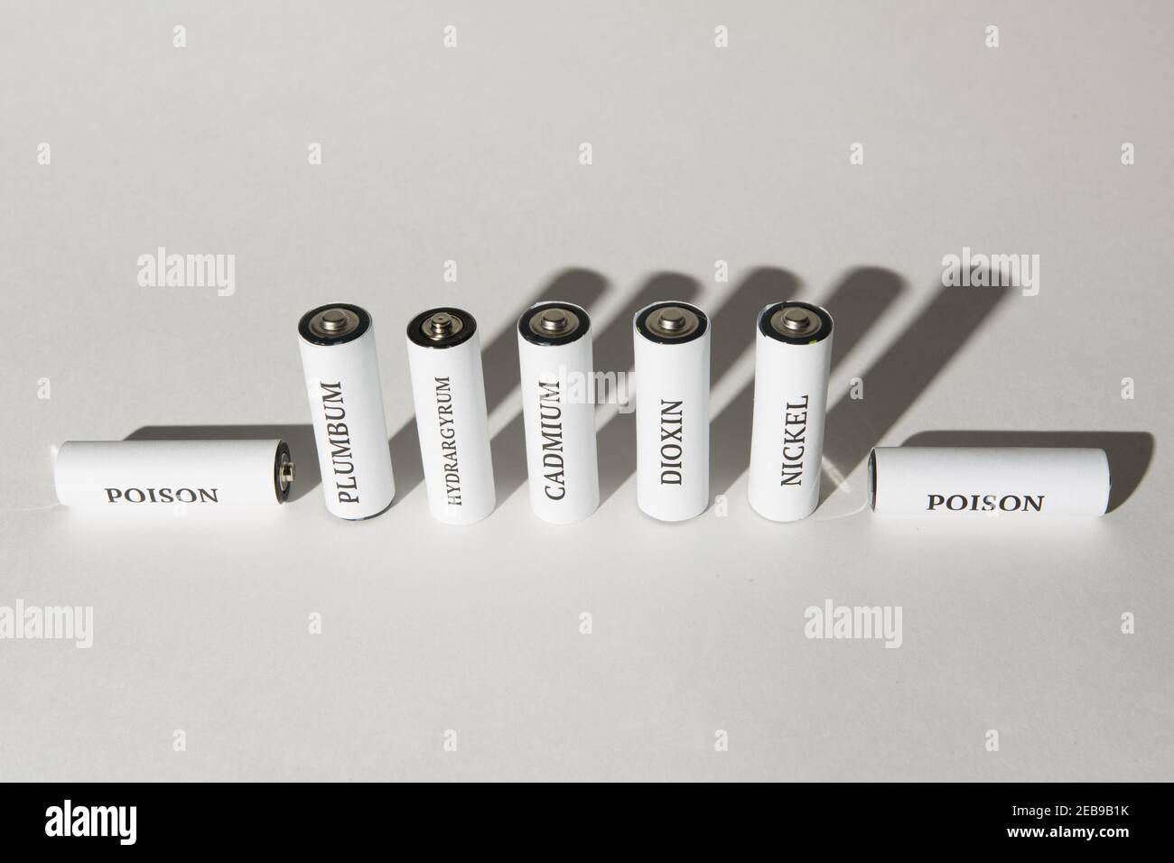 Battery on a white background. Battery for charging. Ecology. Harm to ...