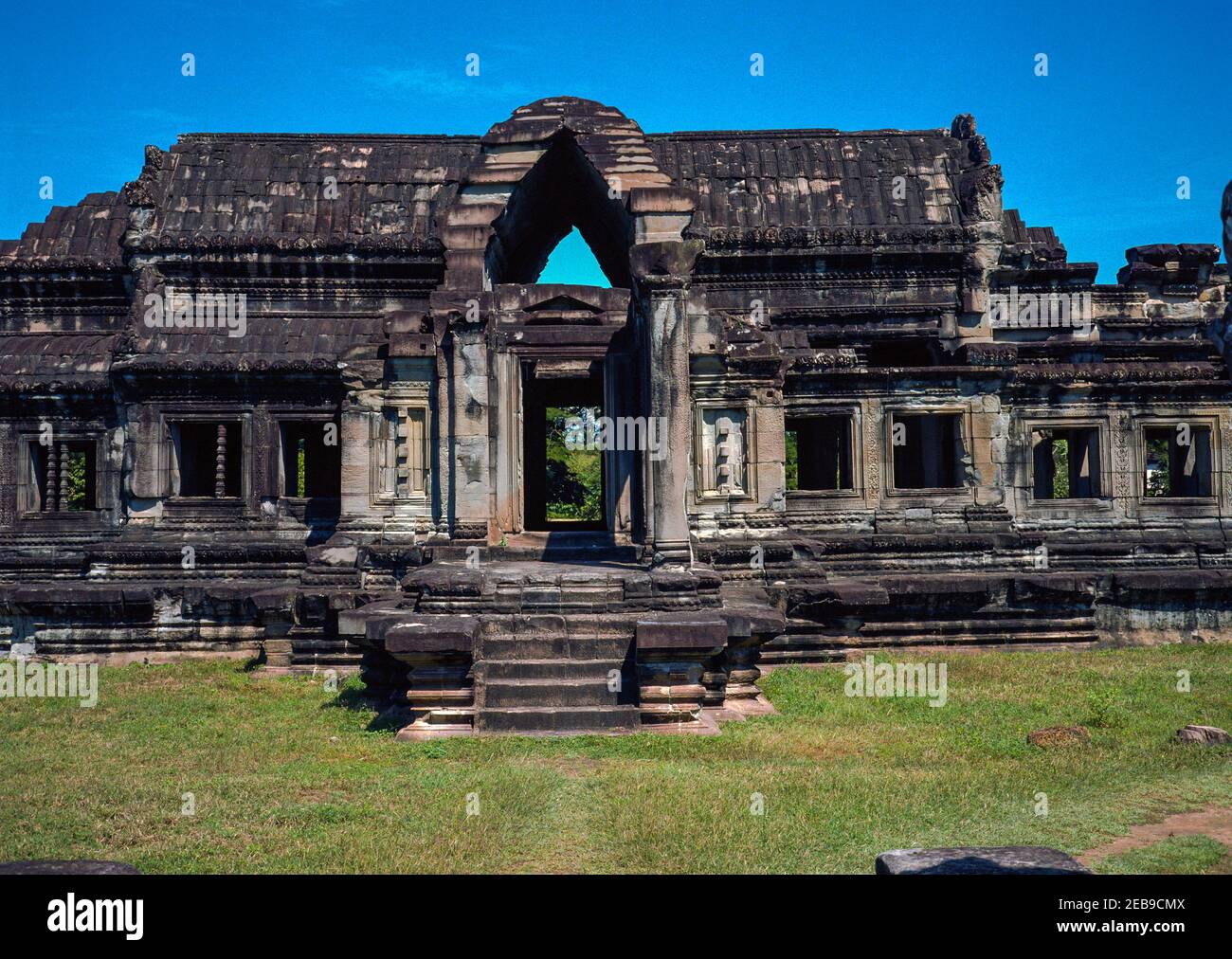 Cambodia Temple with green grass and blue Sky Stock Photo - Alamy