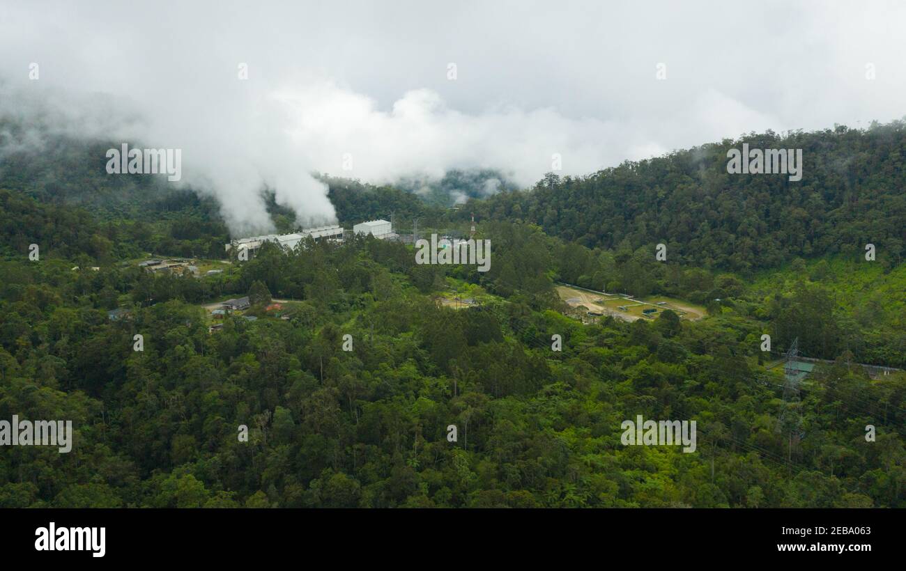 Geotermal power plant on Mount Apo. Steam and pipework at the ...