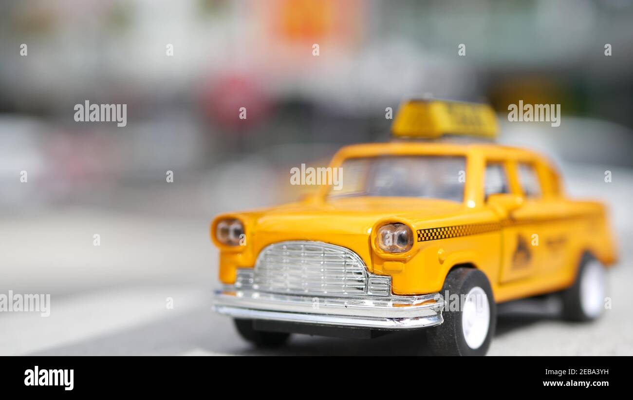 Yellow vacant mini taxi cab close up, Harmon corner, Las Vegas, USA ...