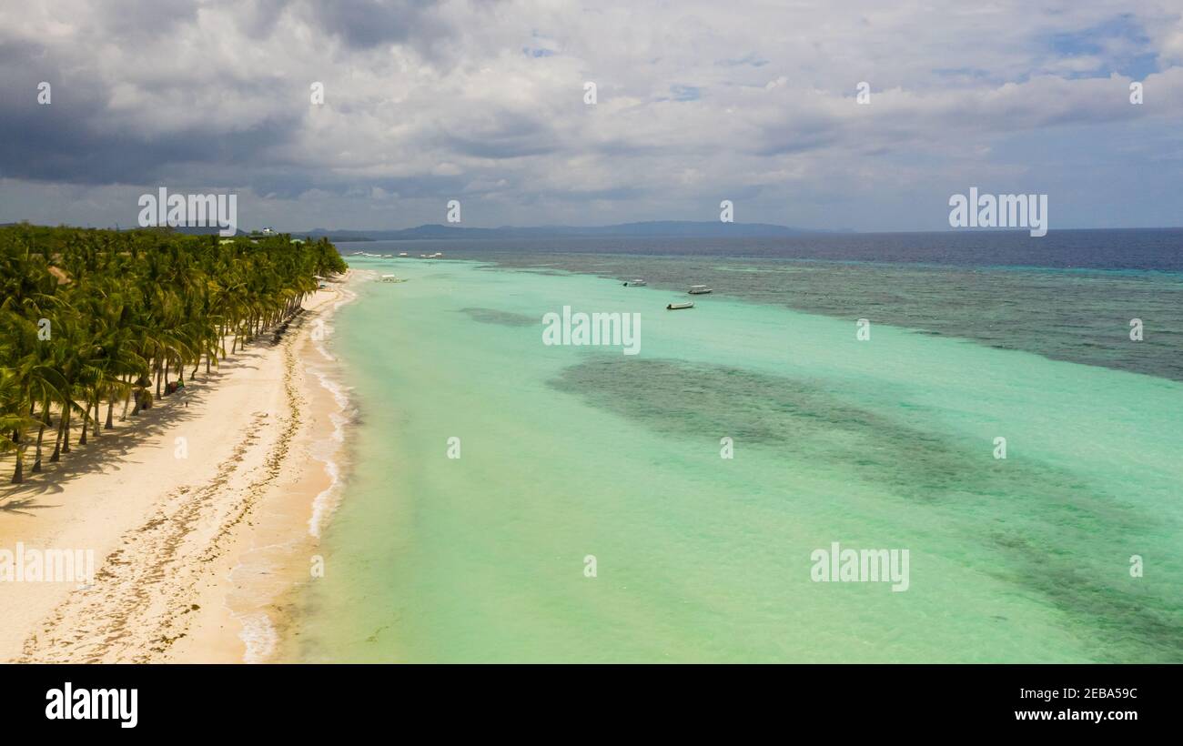 Beautiful tropical beach with white sand, palm trees, turquoise ocean ...