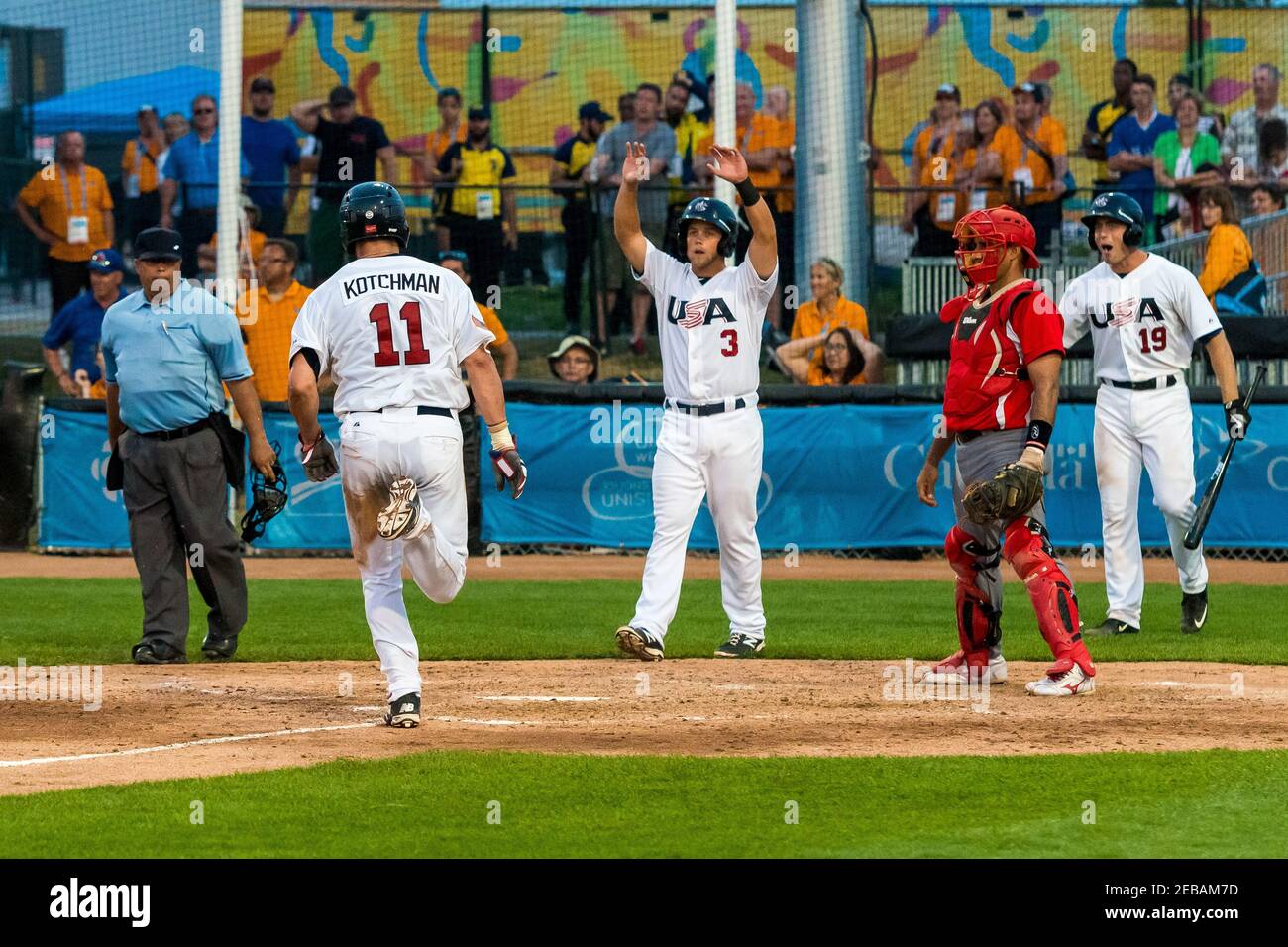 Jacob Wilson (number 3) receives Casey Kotchman (number 11) at home ...