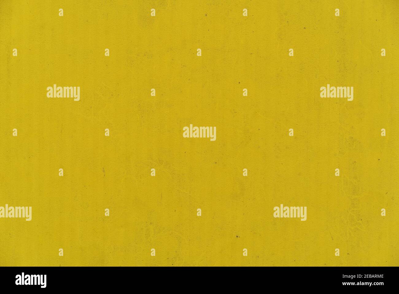 Nice concrete background toned yellow, natural textured surface ...