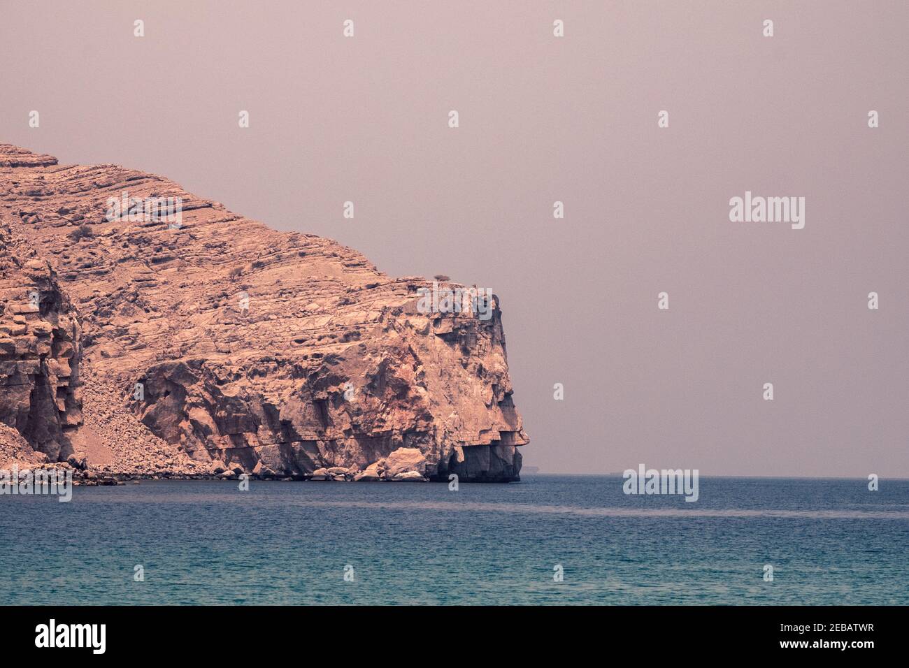 Wide-angle lens shot of mountains near the sea in Khasab, Oman Stock ...