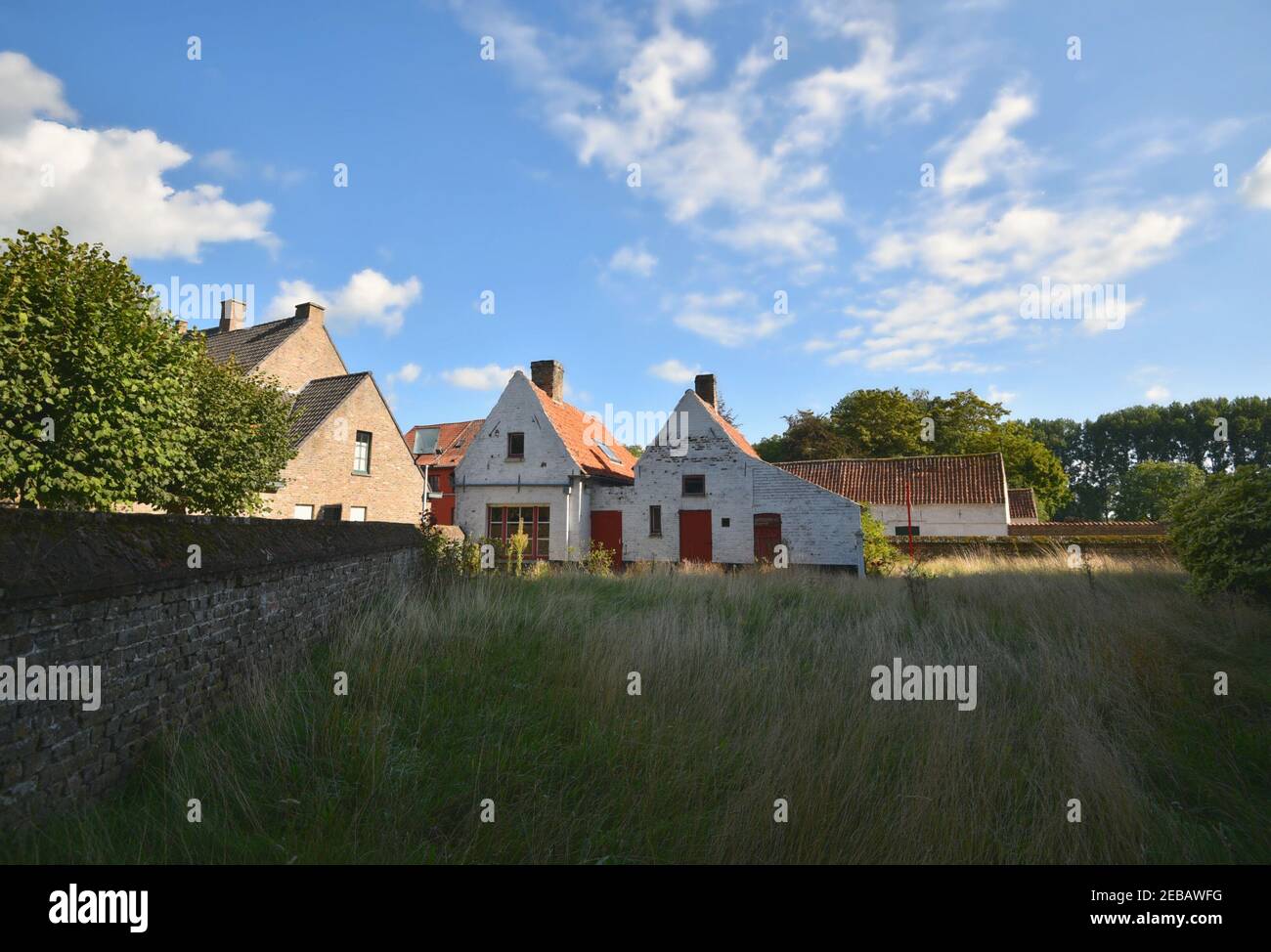 Typical Flemish rural houses in the countryside of Damme, a picturesque ...