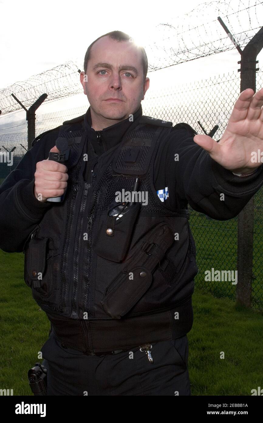 UK Police Officer using Incapacitant Spray Stock Photo - Alamy