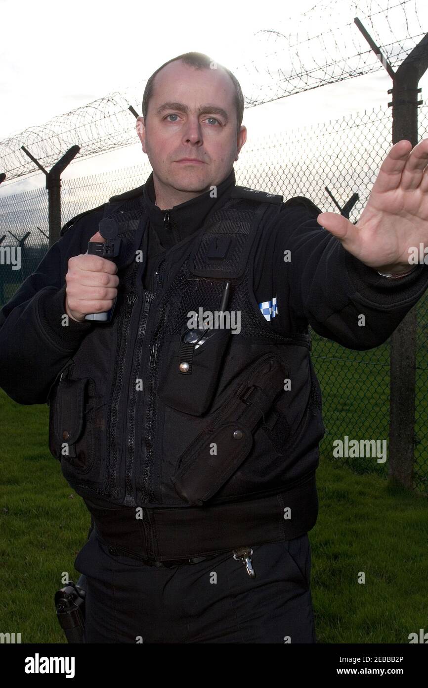 UK Police Officer using Incapacitant Spray Stock Photo - Alamy