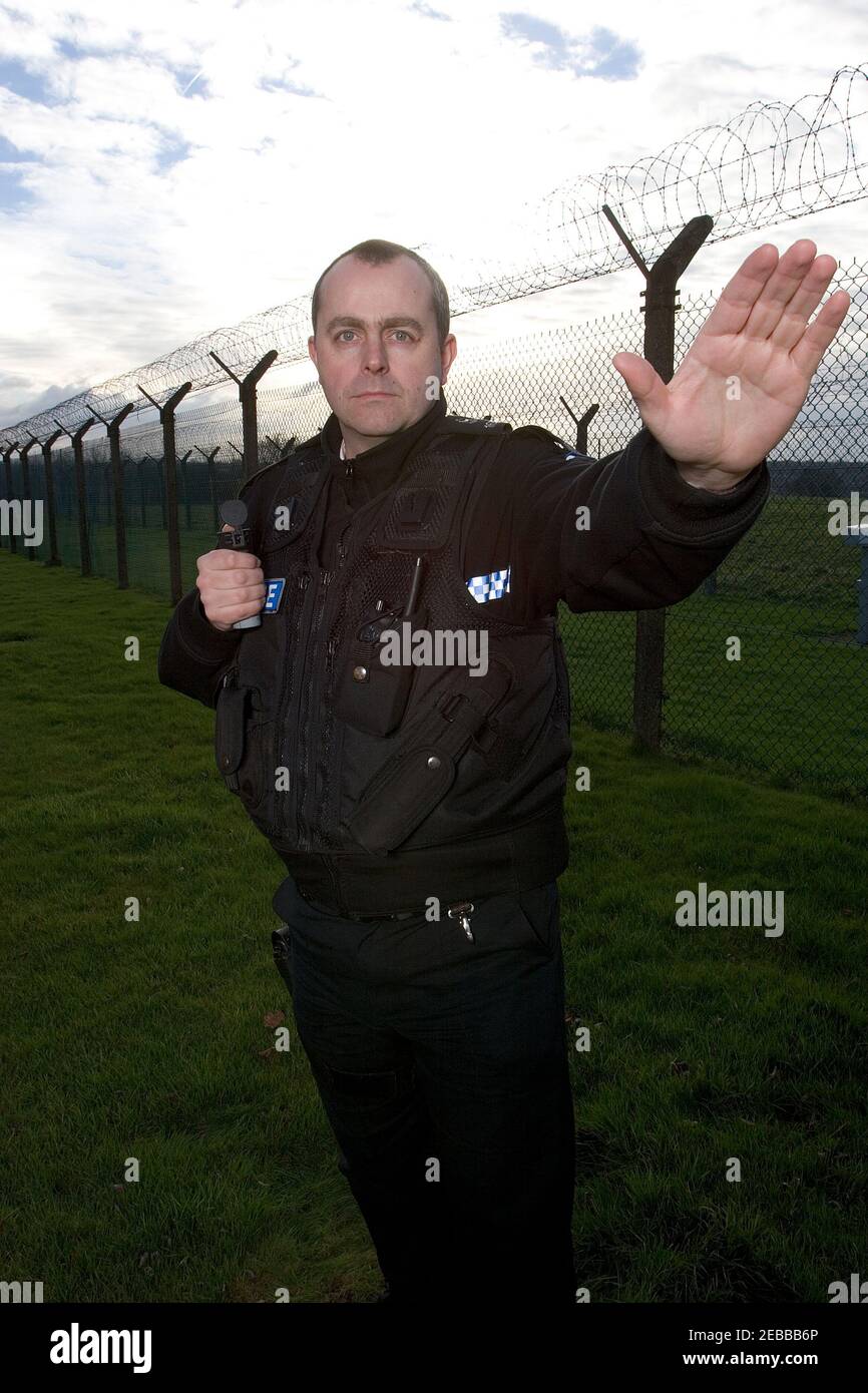 UK Police Officer using Incapacitant Spray Stock Photo - Alamy