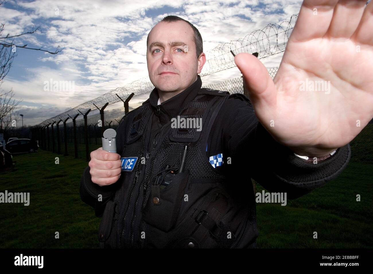 UK Police Officer using Incapacitant Spray Stock Photo - Alamy