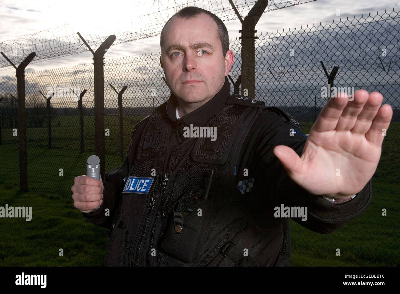 UK Police Officer using Incapacitant Spray Stock Photo - Alamy