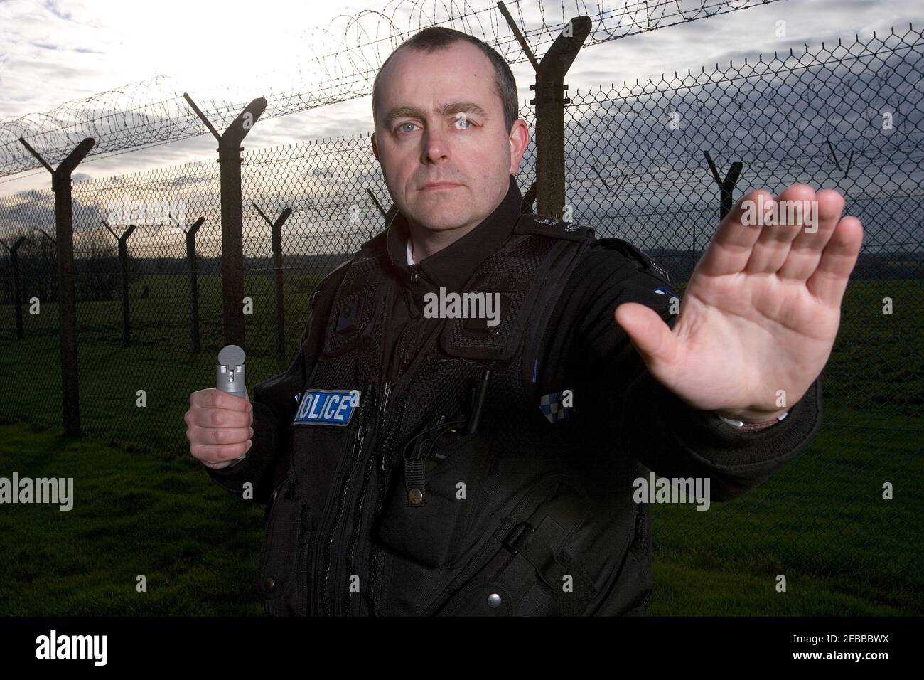 UK Police Officer using Incapacitant Spray Stock Photo - Alamy