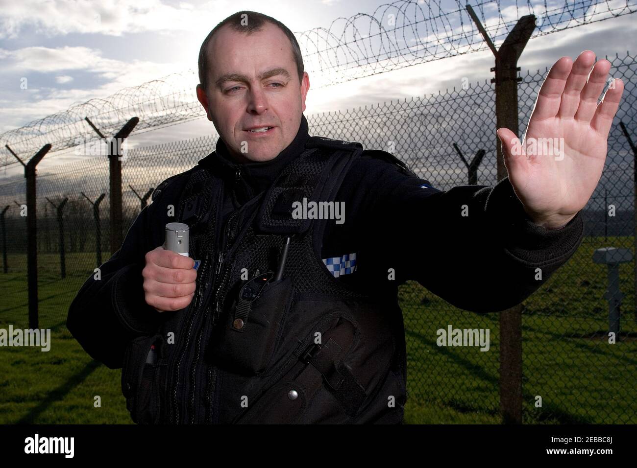 UK Police Officer using Incapacitant Spray Stock Photo - Alamy